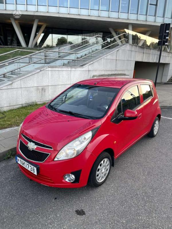 Red Chevrolet Spark 2010 in Vilnius, with an engine capacity of 1.00 L and mileage of 149 thousand km for 1050 €, photo 2 on AUTOMOTO.COM.LV