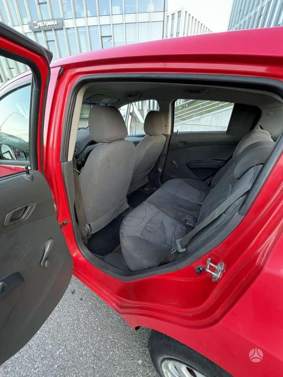 Sarkans Chevrolet Spark 2010 Viļņa, ar dzinēja tilpumu 1.00 L un nobraukumu 149 tūkst. km par 1050 €, foto 13 vietnē AUTOMOTO.COM.LV