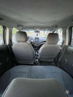Sarkans Chevrolet Spark 2010 Viļņa, ar dzinēja tilpumu 1.00 L un nobraukumu 149 tūkst. km par 1050 €, foto 14 vietnē AUTOMOTO.COM.LV