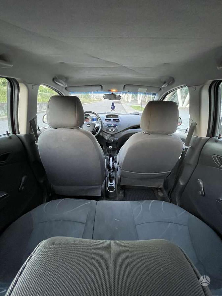Sarkans Chevrolet Spark 2010 Viļņa, ar dzinēja tilpumu 1.00 L un nobraukumu 149 tūkst. km par 1050 €, foto 14 vietnē AUTOMOTO.COM.LV