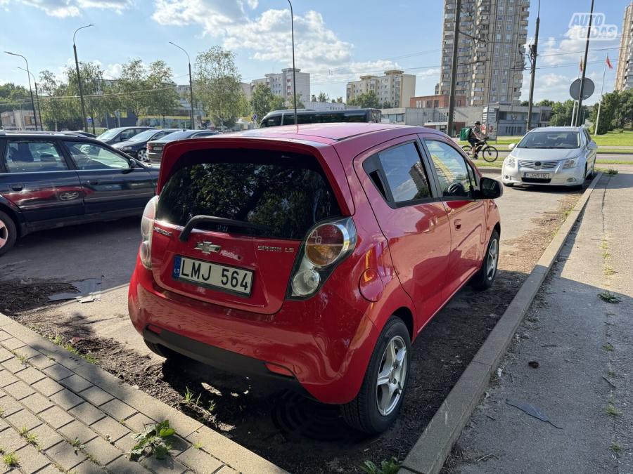 Sarkans Chevrolet Spark 2010 Kauņa, ar dzinēja tilpumu 1.00 L un nobraukumu 242 tūkst. km par 2000 €, foto 6 vietnē AUTOMOTO.COM.LV