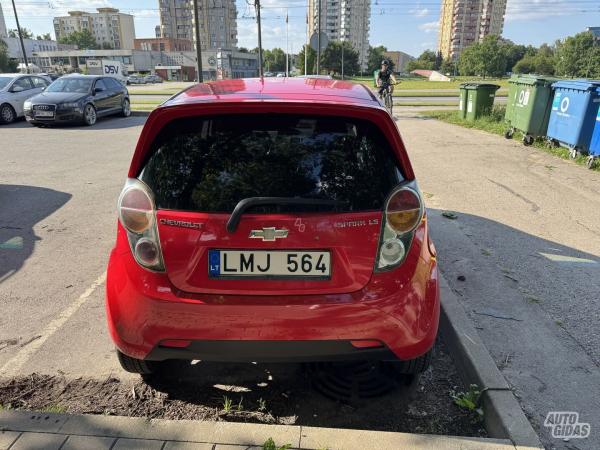 Sarkans Chevrolet Spark 2010 Kauņa, ar dzinēja tilpumu 1.00 L un nobraukumu 242 tūkst. km par 2000 €, foto 6 vietnē AUTOMOTO.COM.LV