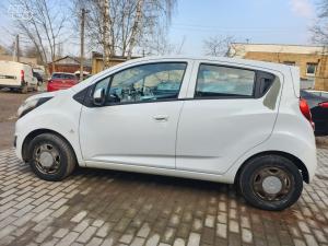 White Chevrolet Spark 2013 in Vilnius, with an engine capacity of 1.00 L and mileage of 136 thousand km for 1400 €, photo 5 on AUTOMOTO.COM.LV