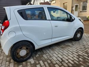 White Chevrolet Spark 2013 in Vilnius, with an engine capacity of 1.00 L and mileage of 136 thousand km for 1400 €, photo 6 on AUTOMOTO.COM.LV