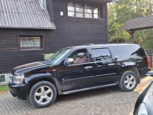 Melns Chevrolet Suburban 2011 Telšiai, ar dzinēja tilpumu 5.30 L un nobraukumu 315 tūkst. km par 12000 €, foto 26 vietnē AUTOMOTO.COM.LV