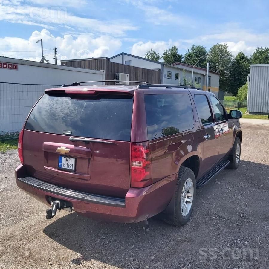 Sarkans Chevrolet Suburban 2008 Ogre, ar dzinēja tilpumu 5.30 L un nobraukumu 306 tūkst. km par 14500 €, foto 3 vietnē AUTOMOTO.COM.LV