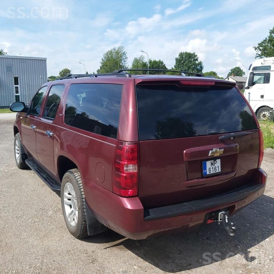 Sarkans Chevrolet Suburban 2008 Ogre, ar dzinēja tilpumu 5.30 L un nobraukumu 306 tūkst. km par 14500 €, foto 4 vietnē AUTOMOTO.COM.LV