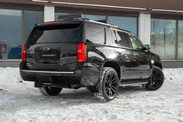 Black Chevrolet Tahoe 2016 in Vilnius, with an engine capacity of 5.30 L and mileage of 217 thousand km for 25000 €, photo 3 on AUTOMOTO.COM.LV