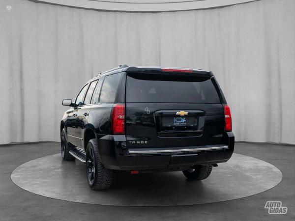 Black Chevrolet Tahoe 2016 in Marijampole, with an engine capacity of 5.30 L and mileage of 130 thousand km for 34450 €, photo 9 on AUTOMOTO.COM.LV
