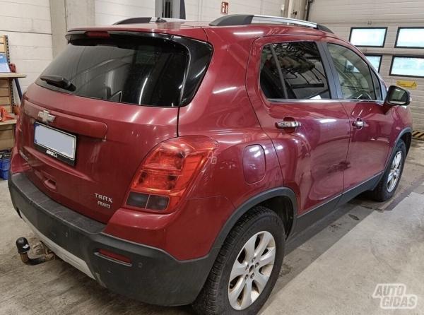 Red Chevrolet Trax 2013 in Kaunas, with an engine capacity of 1.40 L and mileage of 290 thousand km for 3300 €, photo 4 on AUTOMOTO.COM.LV