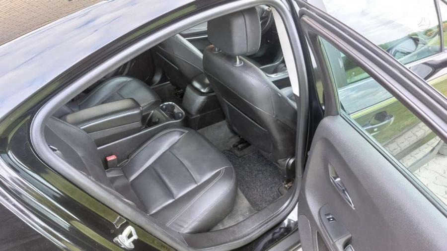 Black Chevrolet Volt 2013 in Siauliai, with an engine capacity of 1.40 L and mileage of 230 thousand km for 2750 €, photo 13 on AUTOMOTO.COM.LV