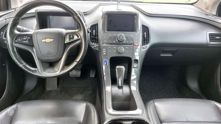 Black Chevrolet Volt 2013 in Siauliai, with an engine capacity of 1.40 L and mileage of 230 thousand km for 2750 €, photo 15 on AUTOMOTO.COM.LV