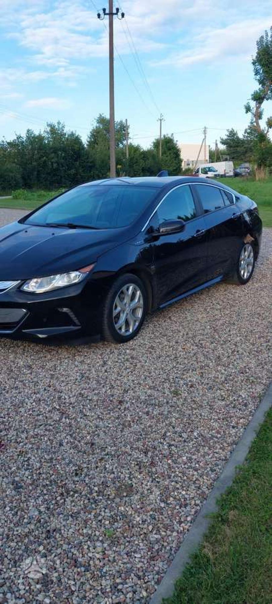 Black Chevrolet Volt 2017 in Vilnius, with an engine capacity of 1.49 L and mileage of 146 thousand km for 11200 €, photo 12 on AUTOMOTO.COM.LV