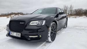 Black Chrysler 300 2015 in Vilnius, with an engine capacity of 3.60 L and mileage of 94 thousand km for 13950 €, photo 24 on AUTOMOTO.COM.LV
