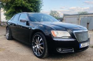 Black Chrysler 300C 2011 in Kaunas, with an engine capacity of 3.60 L and mileage of 283 thousand km for 6000 €, photo 16 on AUTOMOTO.COM.LV