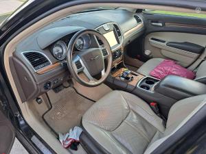 Black Chrysler 300C 2013 in Mazeikiai, with an engine capacity of 3.60 L and mileage of 267 thousand km for 7650 €, photo 5 on AUTOMOTO.COM.LV