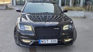 Black Chrysler 300C 2015 in Vilnius, with an engine capacity of 3.60 L and mileage of 102 thousand km for 13500 €, photo 4 on AUTOMOTO.COM.LV