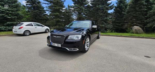 Black Chrysler 300C 2017 in Siauliai, with an engine capacity of 3.60 L and mileage of 130 thousand km for 12000 €, photo 1 on AUTOMOTO.COM.LV