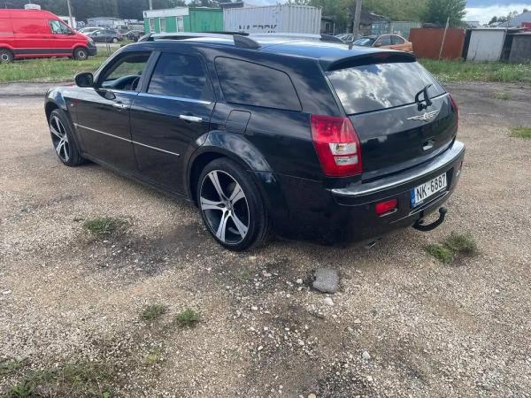 Black Chrysler 300C 2007 in Riga, with an engine capacity of 1.00 L and mileage of 250 thousand km for 3790 €, photo 6 on AUTOMOTO.COM.LV