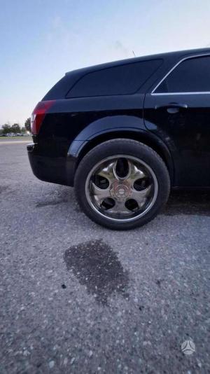 Black Chrysler 300C 2009 in Kaunas, with an engine capacity of 3.00 L and mileage of 351 thousand km for 3950 €, photo 12 on AUTOMOTO.COM.LV