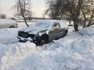 Green Chrysler 300C 2004 in Dobele, with an engine capacity of 5.70 L and mileage of 218 thousand km for 1500 €, photo 10 on AUTOMOTO.COM.LV