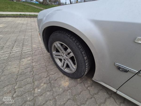 Grey Chrysler 300C 2006 in Klaipeda, with an engine capacity of 3.00 L and mileage of 409 thousand km for 1800 €, photo 9 on AUTOMOTO.COM.LV