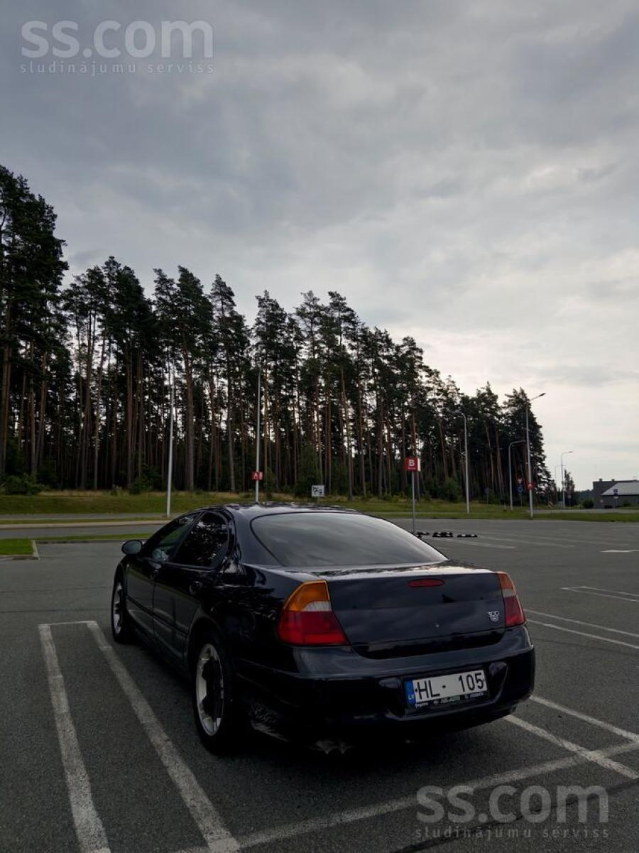 Black Chrysler 300M 1999 in Riga, with an engine capacity of 3.50 L and mileage of 327 thousand km for 700 €, photo 4 on AUTOMOTO.COM.LV