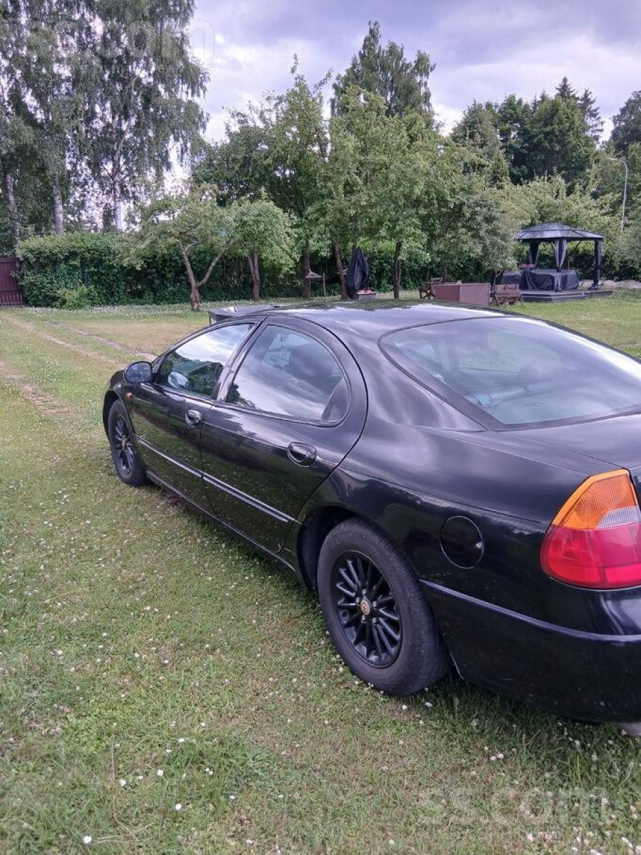 Black Chrysler 300M 2001 in Riga, with an engine capacity of 3.50 L and mileage of 245 thousand km for 1450 €, photo 5 on AUTOMOTO.COM.LV