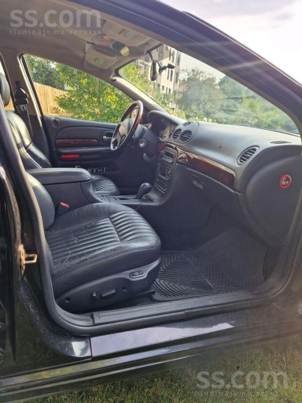Melns Chrysler 300M 2003 Rīga, ar dzinēja tilpumu 3.50 L un nobraukumu 150 tūkst. km par 450 €, foto 9 vietnē AUTOMOTO.COM.LV