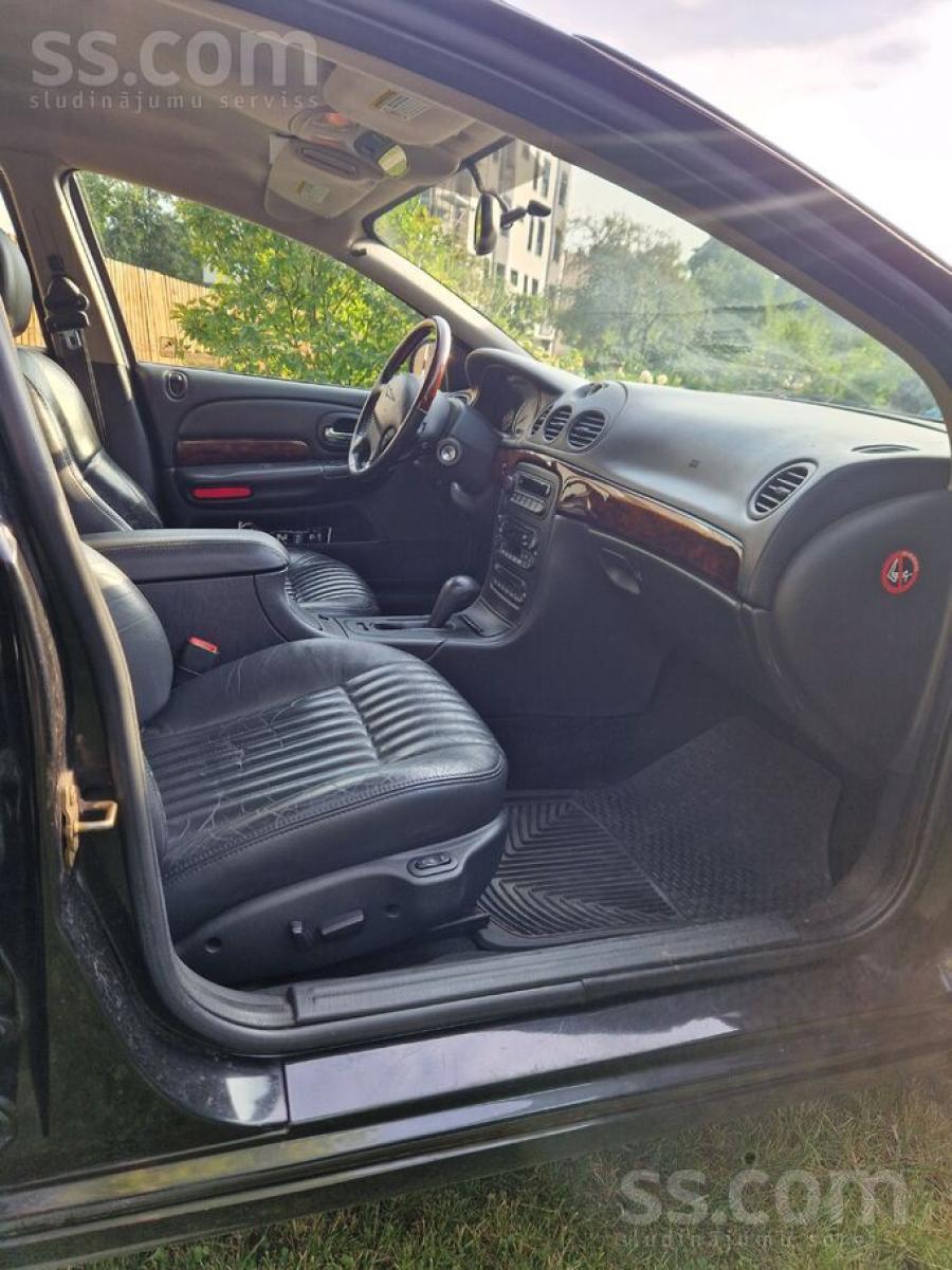 Melns Chrysler 300M 2003 Rīga, ar dzinēja tilpumu 3.50 L un nobraukumu 150 tūkst. km par 450 €, foto 10 vietnē AUTOMOTO.COM.LV