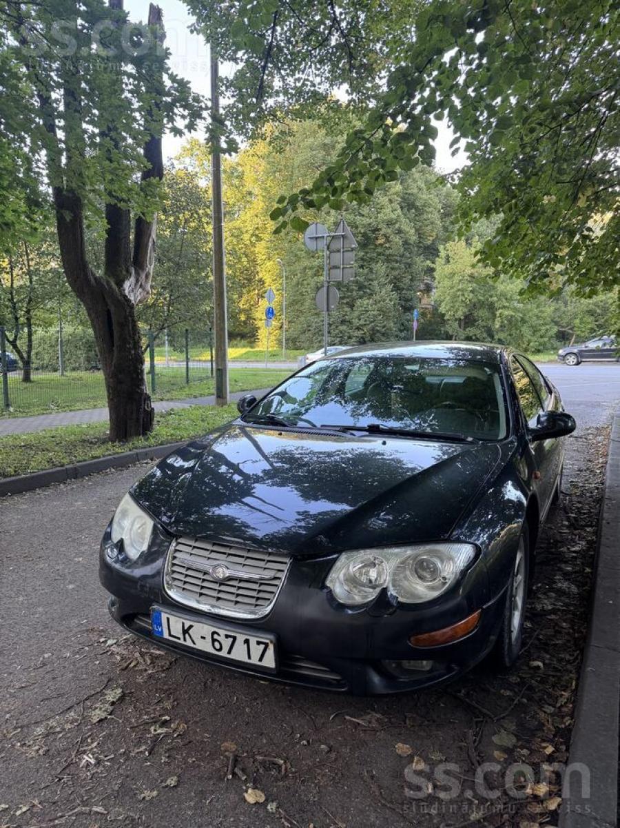Melns Chrysler 300M 2003 Rīga, ar dzinēja tilpumu 3.50 L un nobraukumu 150 tūkst. km par 599 €, foto 1 vietnē AUTOMOTO.COM.LV