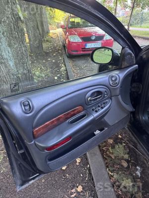 Melns Chrysler 300M 2003 Rīga, ar dzinēja tilpumu 3.50 L un nobraukumu 150 tūkst. km par 599 €, foto 5 vietnē AUTOMOTO.COM.LV