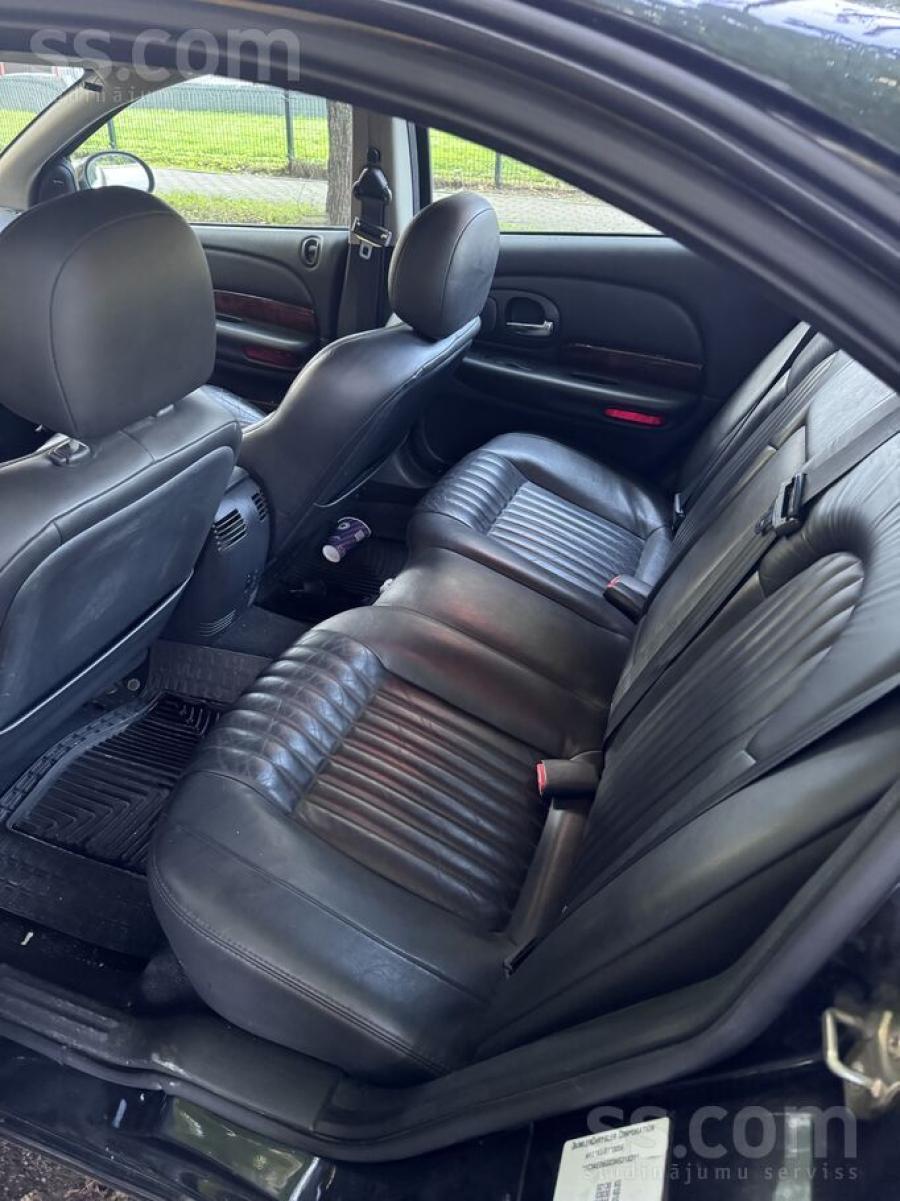 Melns Chrysler 300M 2003 Rīga, ar dzinēja tilpumu 3.50 L un nobraukumu 150 tūkst. km par 599 €, foto 6 vietnē AUTOMOTO.COM.LV