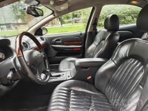 Melns Chrysler 300M 2003 Rīga, ar dzinēja tilpumu 3.50 L un nobraukumu 0 tūkst. km par 2350 €, foto 9 vietnē AUTOMOTO.COM.LV