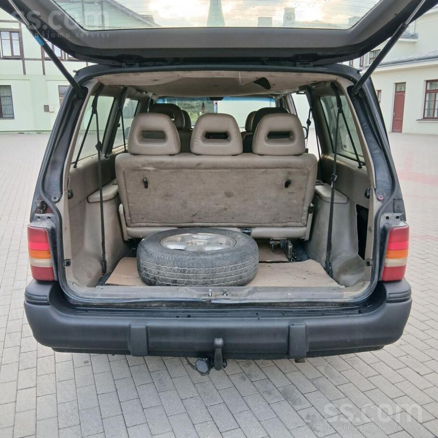 Black Chrysler Grand Voyager 1994 in Dobele, with an engine capacity of 2.50 L and mileage of 470 thousand km for 2000 €, photo 13 on AUTOMOTO.COM.LV