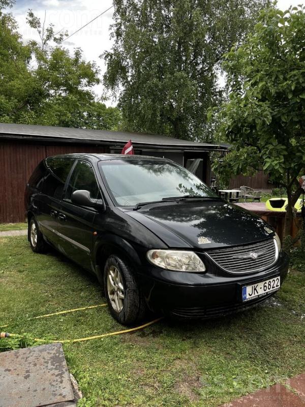 Melns Chrysler Grand Voyager 2002 Rīga, ar dzinēja tilpumu 2.40 L un nobraukumu 280 tūkst. km par 790 €, foto 1 vietnē AUTOMOTO.COM.LV
