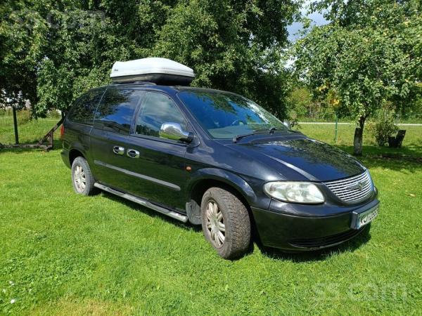 Melns Chrysler Grand Voyager 2003 Rīga, ar dzinēja tilpumu 2.50 L un nobraukumu 445 tūkst. km par 1600 €, foto 2 vietnē AUTOMOTO.COM.LV