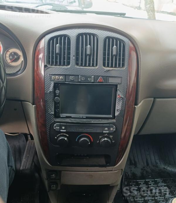 Melns Chrysler Grand Voyager 2003 Rīga, ar dzinēja tilpumu 2.50 L un nobraukumu 445 tūkst. km par 1600 €, foto 7 vietnē AUTOMOTO.COM.LV