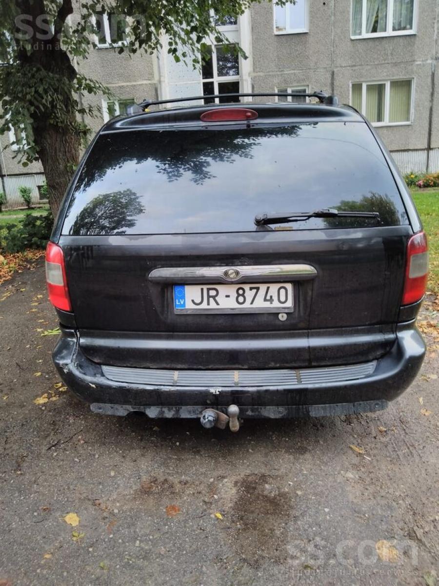 Black Chrysler Grand Voyager 2005 in Riga, with an engine capacity of 2.80 L and mileage of 317 thousand km for 1500 €, photo 5 on AUTOMOTO.COM.LV