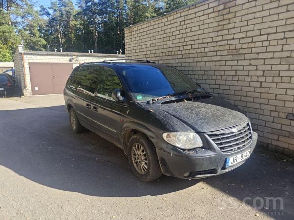 Melns Chrysler Grand Voyager 2005 Rīga, ar dzinēja tilpumu 2.80 L un nobraukumu 317 tūkst. km par 1500 €, foto 1 vietnē AUTOMOTO.COM.LV