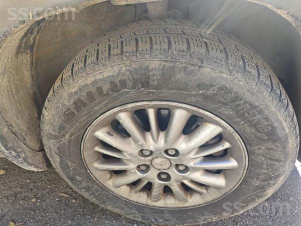 Melns Chrysler Grand Voyager 2005 Rīga, ar dzinēja tilpumu 2.80 L un nobraukumu 317 tūkst. km par 1500 €, foto 6 vietnē AUTOMOTO.COM.LV