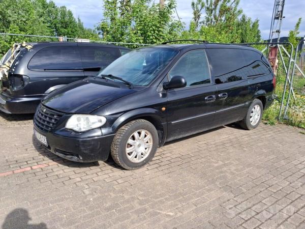Melns Chrysler Grand Voyager 2006 Rīga, ar dzinēja tilpumu 2.80 L un nobraukumu 273 tūkst. km par 1300 €, foto 1 vietnē AUTOMOTO.COM.LV
