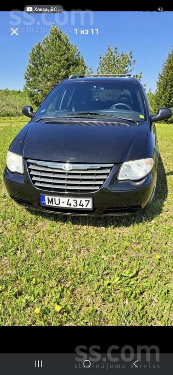 Black Chrysler Grand Voyager 2006 in Rezekne, with an engine capacity of 2.80 L and mileage of 26 thousand km for 1900 €, photo 2 on AUTOMOTO.COM.LV