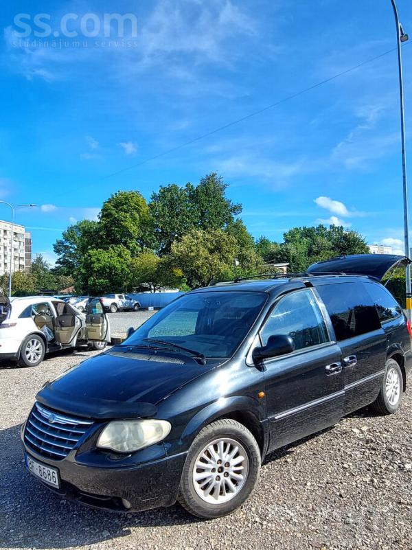 Melns Chrysler Grand Voyager 2006 Rīga, ar dzinēja tilpumu 2.80 L un nobraukumu 317 tūkst. km par 1350 €, foto 3 vietnē AUTOMOTO.COM.LV