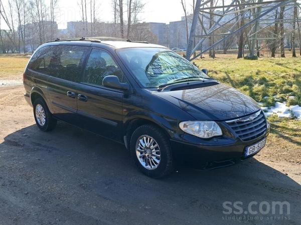 Black Chrysler Grand Voyager 2006 in Riga, with an engine capacity of 2.80 L and mileage of 256 thousand km for 780 €, photo 6 on AUTOMOTO.COM.LV