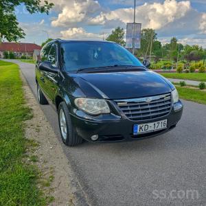 Black Chrysler Grand Voyager 2007 in Ogre, with an engine capacity of 2.80 L and mileage of 315 thousand km for 2350 €, photo 1 on AUTOMOTO.COM.LV