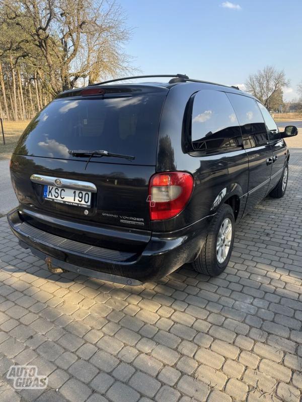 Melns Chrysler Grand Voyager 2007 Druskininkai, ar dzinēja tilpumu 2.80 L un nobraukumu 417 tūkst. km par 1850 €, foto 6 vietnē AUTOMOTO.COM.LV