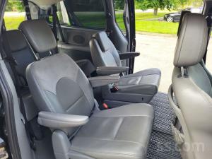 Melns Chrysler Grand Voyager 2007 Rīga, ar dzinēja tilpumu 2.80 L un nobraukumu 249 tūkst. km par 3399 €, foto 14 vietnē AUTOMOTO.COM.LV