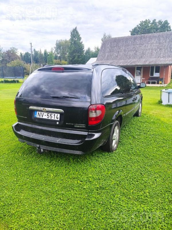 Melns Chrysler Grand Voyager 2007 Dobele, ar dzinēja tilpumu 2.80 L un nobraukumu 250 tūkst. km par 2200 €, foto 1 vietnē AUTOMOTO.COM.LV