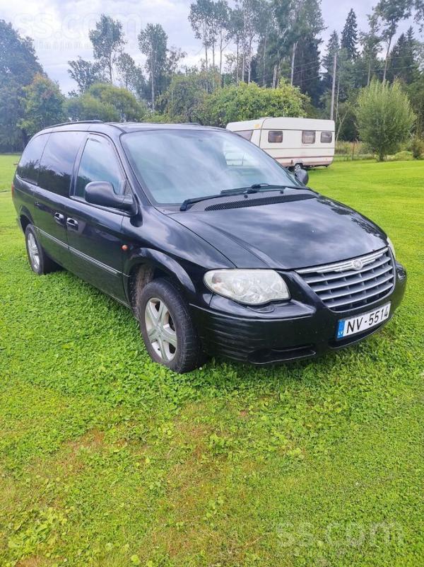 Melns Chrysler Grand Voyager 2007 Dobele, ar dzinēja tilpumu 2.80 L un nobraukumu 250 tūkst. km par 2200 €, foto 3 vietnē AUTOMOTO.COM.LV